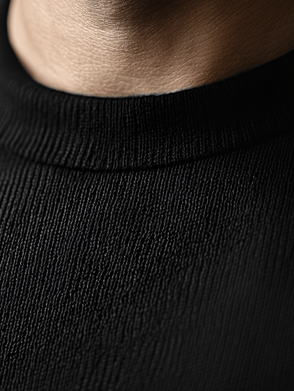 Free Download Close-up of Black Turtleneck Sweater Texture and Skin Detail
